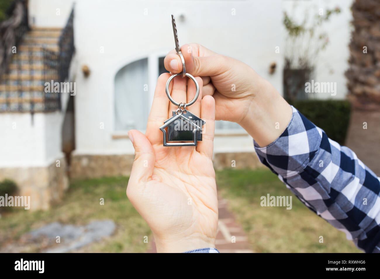 Ownership, property and tenant concept - key in female hand for new ...