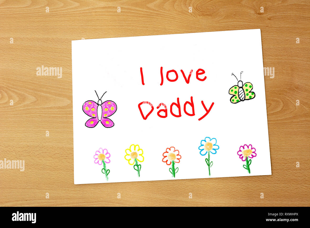 Family drawing written in hi-res stock photography and images - Alamy