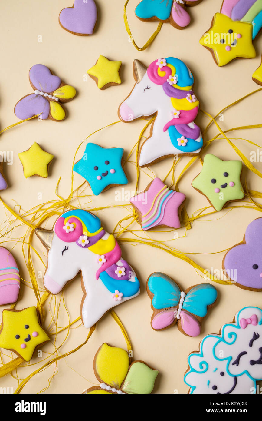 cookies with a icing on a beige background Stock Photo - Alamy