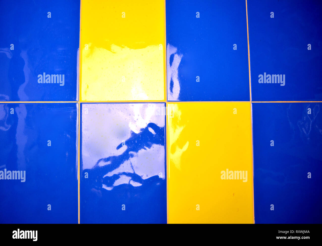blue and yellow acrylic tiles in the bath Stock Photo - Alamy