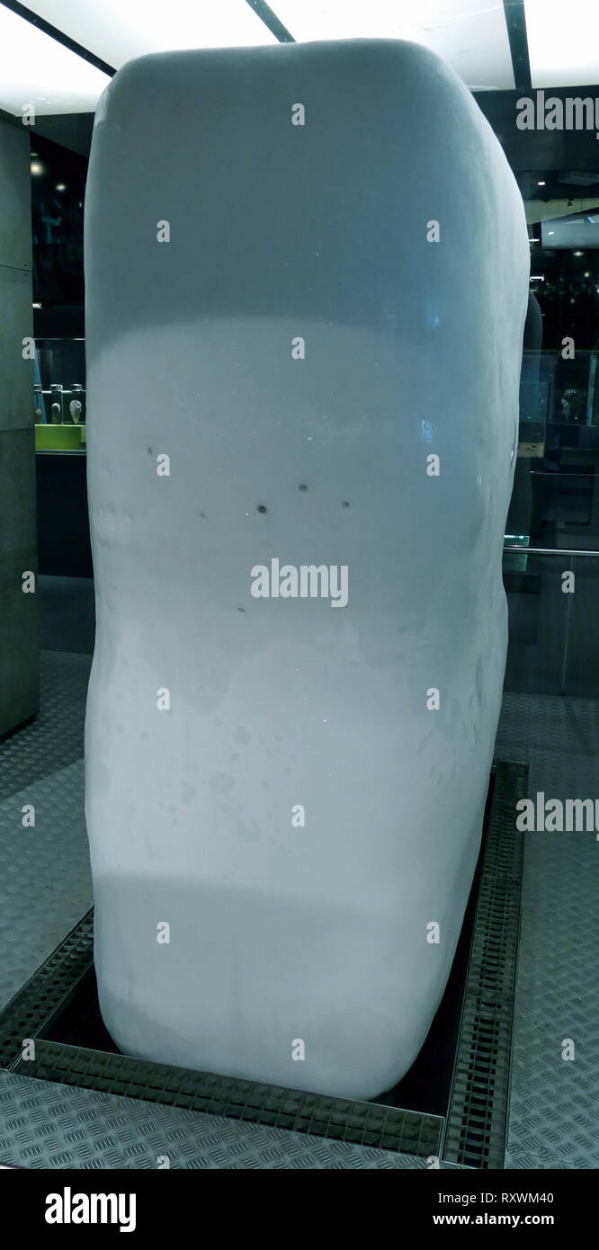 A block of ice. Ice is water frozen into a solid state. Depending on ...