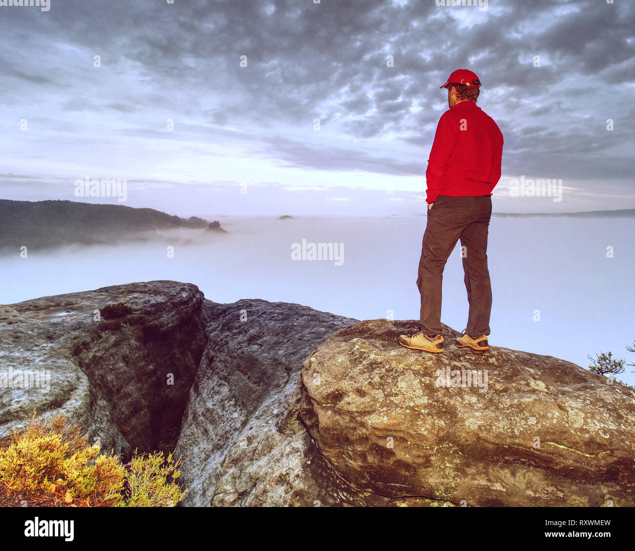 Person cliff gloomy hi-res stock photography and images - Alamy