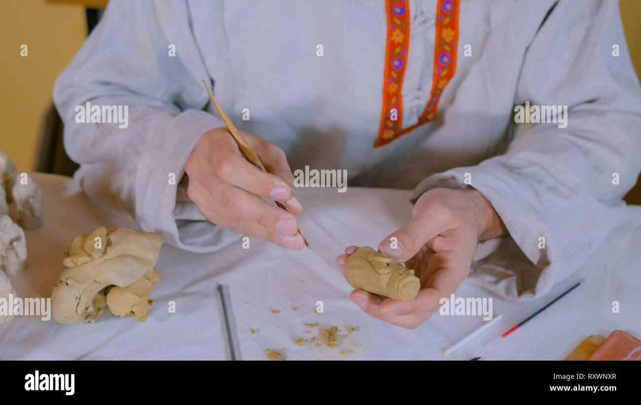 Making clay figure hi-res stock photography and images - Alamy