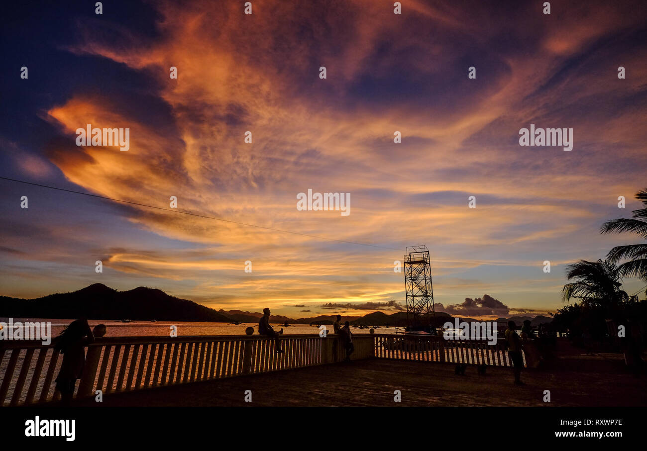 Orange sunset landscape of Coron Main Pier, Palawan Island, Philippines ...