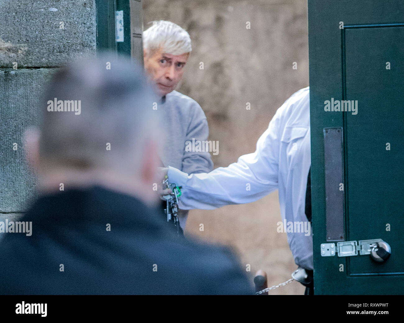 Uk handcuffs prison hi-res stock photography and images - Alamy