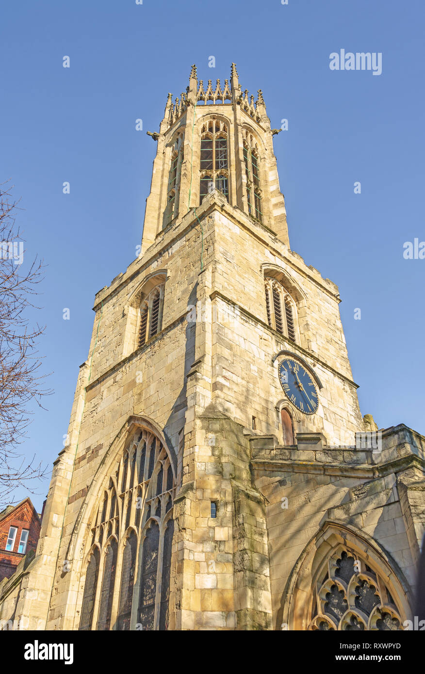 All Saints Church in York with a bell tower reaching upwards. A bare ...