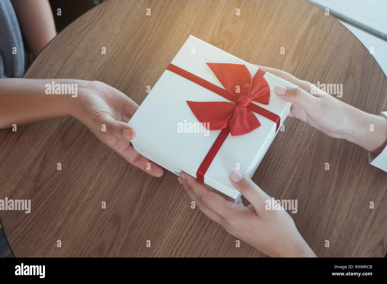 Man giving present birthday party hi-res stock photography and images ...
