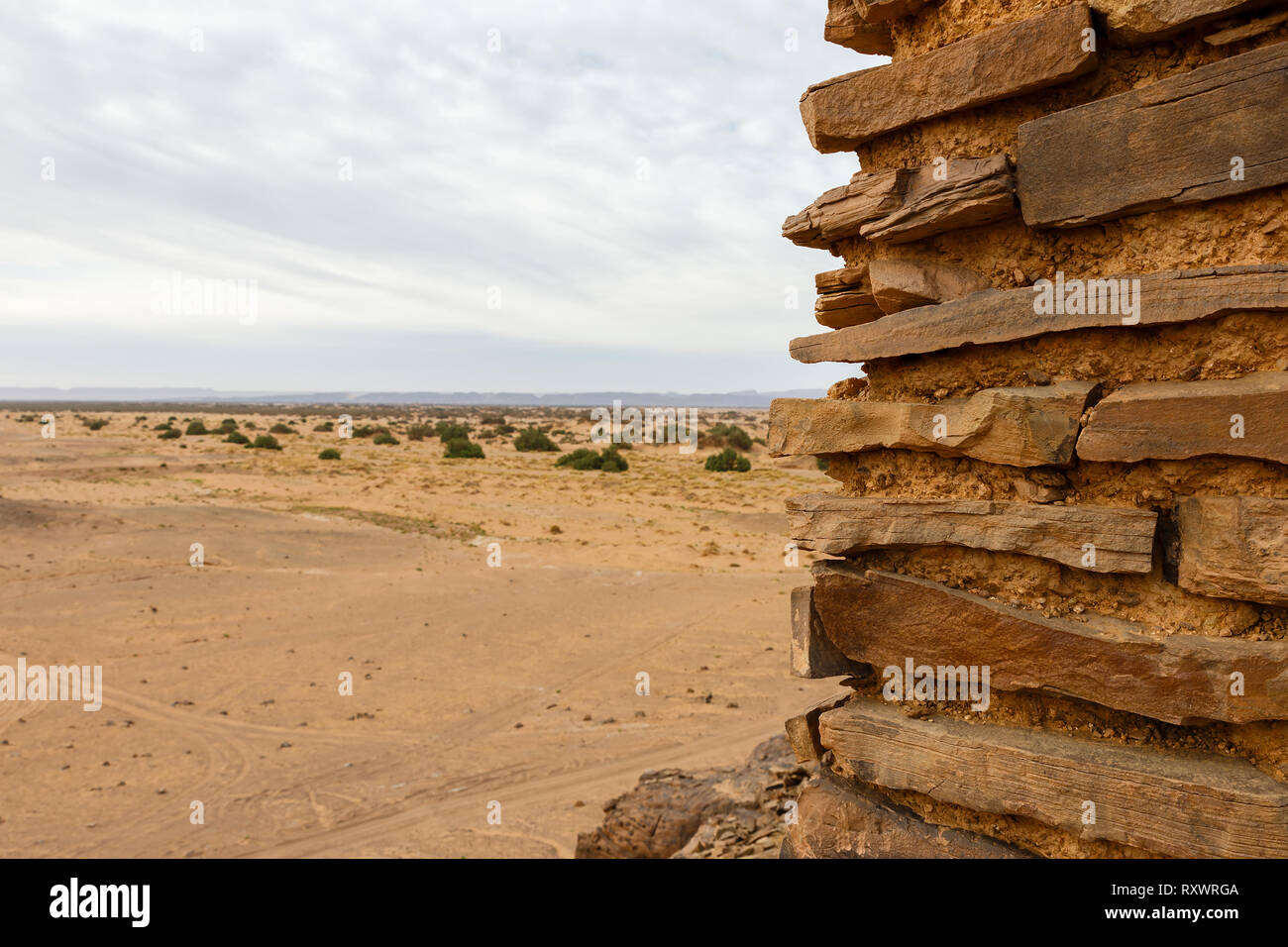 stone wall ruins of the ancient town in the Sahara desert, lost ghost ...