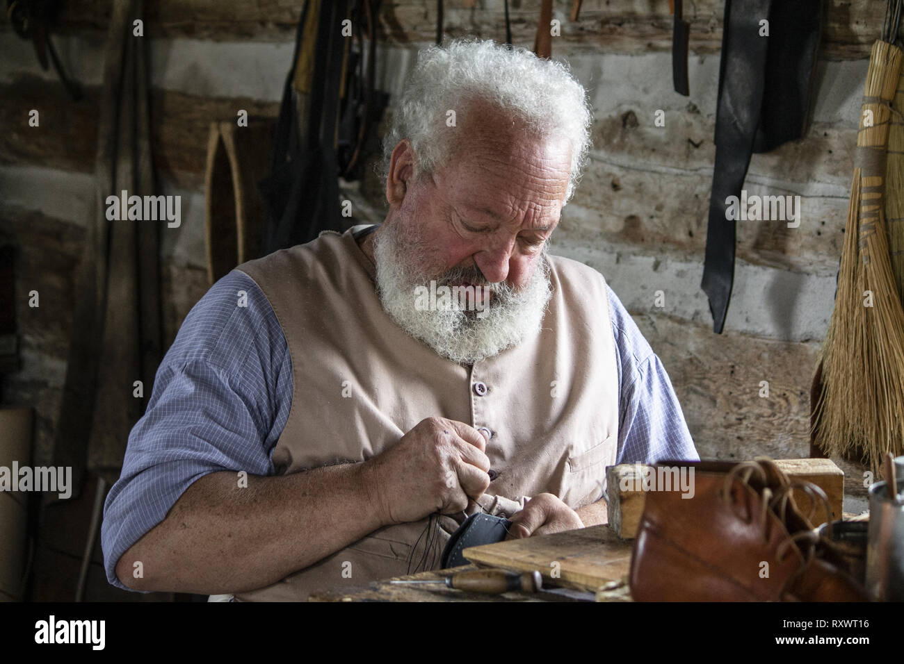 Shoemaker at work Stock Photo - Alamy