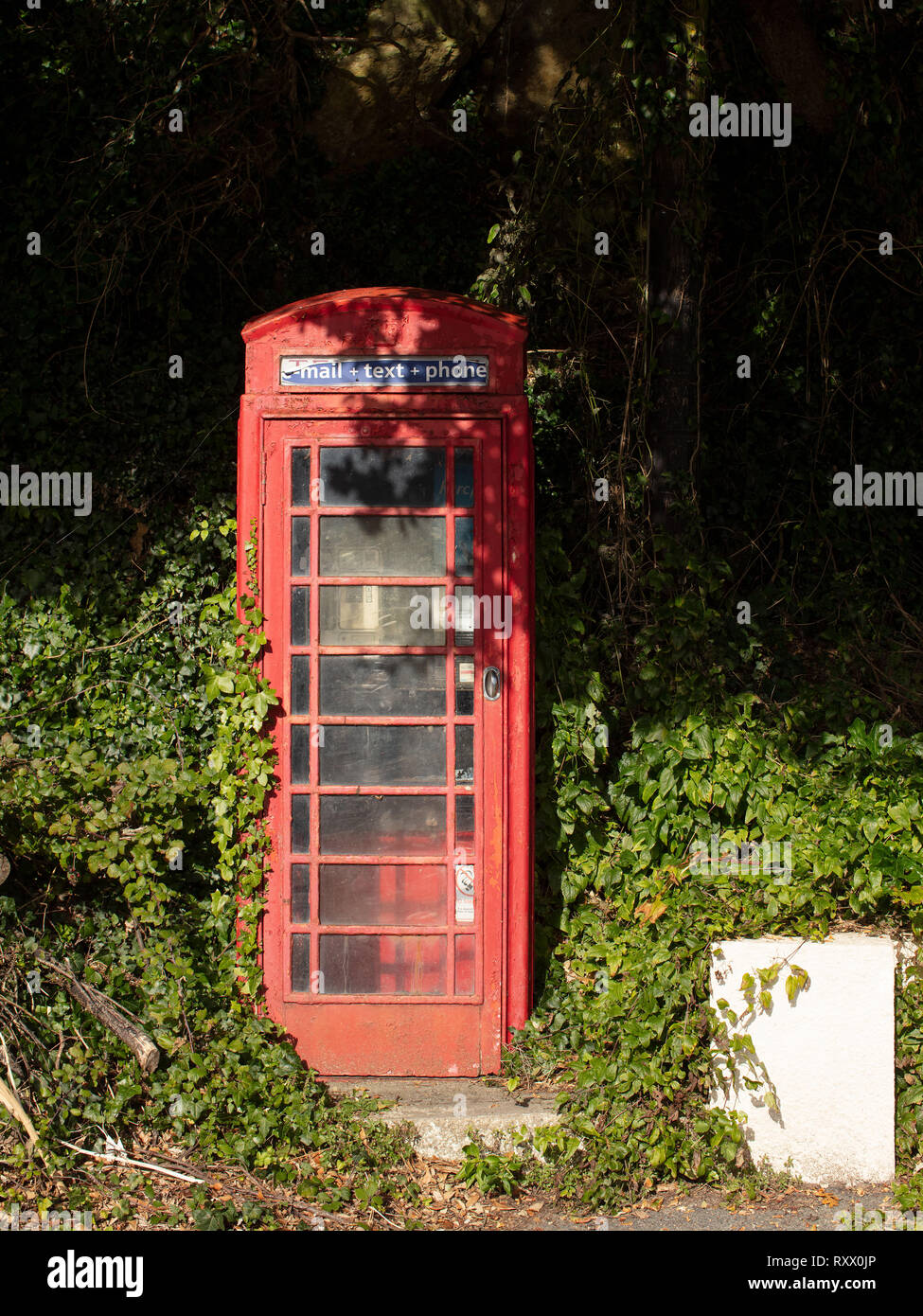 An old red telephone box in North Sands in South Devon Stock Photo - Alamy