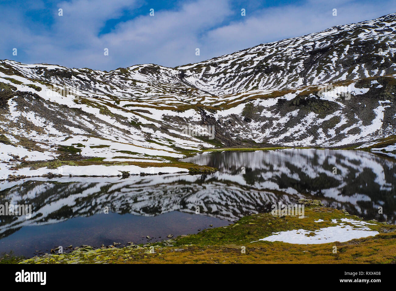 mountain lake Grauer See at Hohe Tauern national park in autumn, East ...