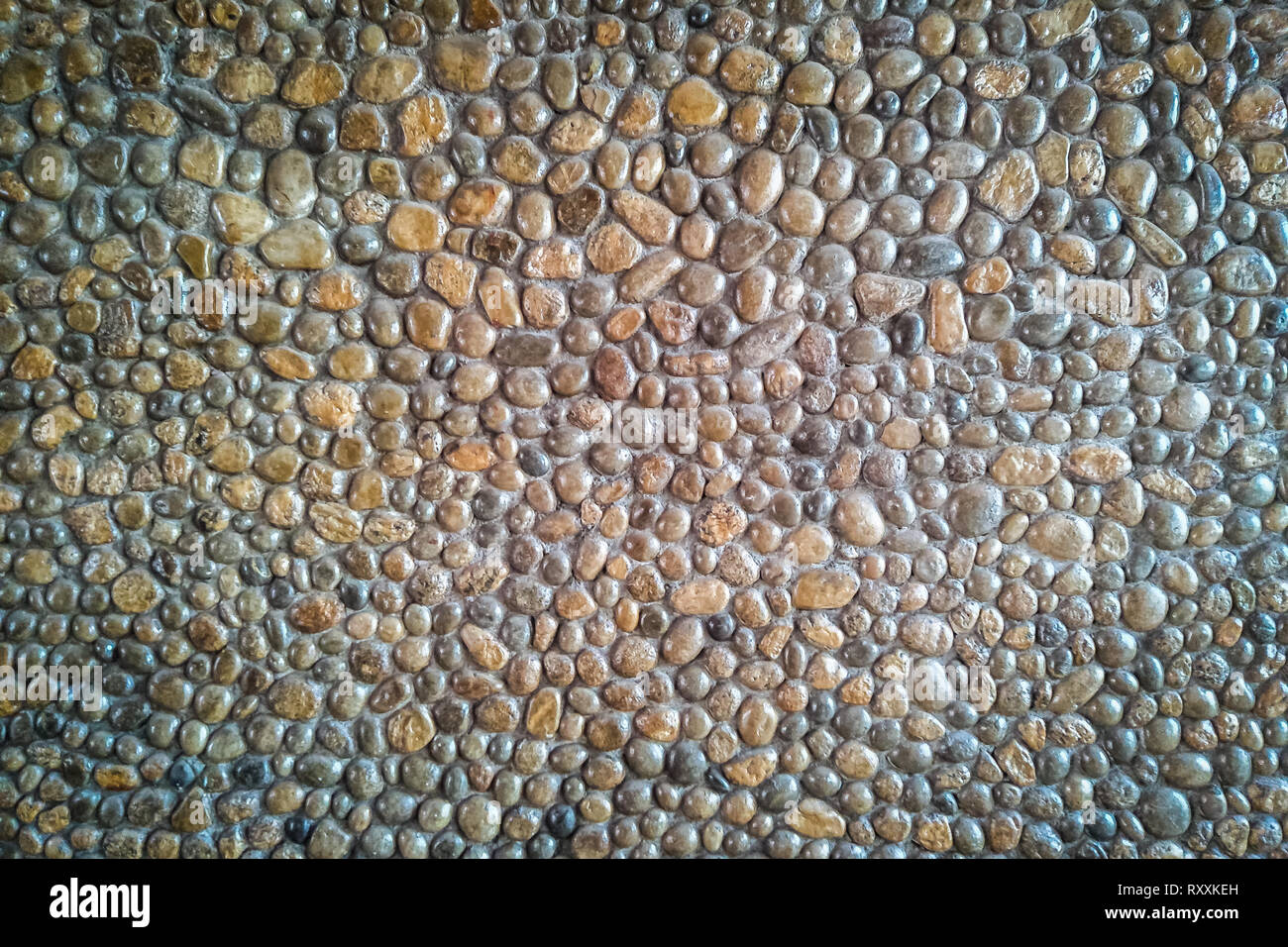 Stone wall rounded stones hi-res stock photography and images - Alamy