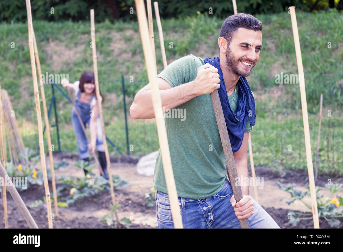 portrait of a young gardener at work in her greenhouse Stock Photo - Alamy