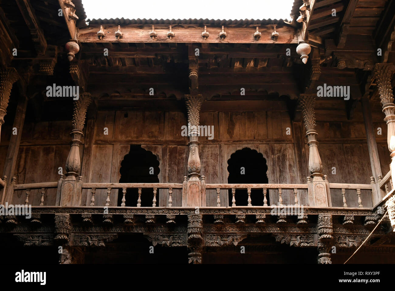 Structural wood work and heavily carved wooden members Palashikar wada ...