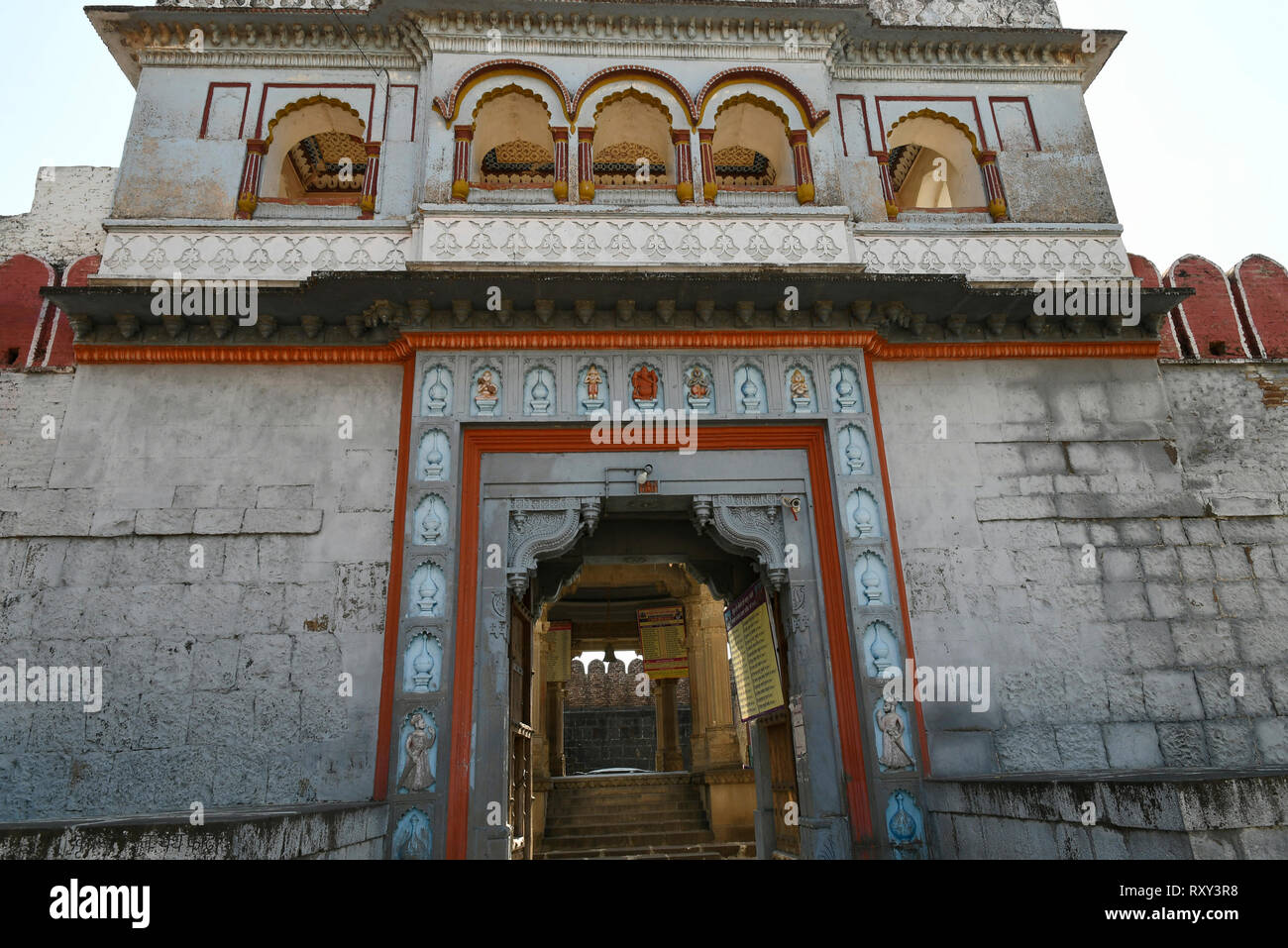 Stone masonry fortified wall and gate at Vitthal Temple, Palashi ...
