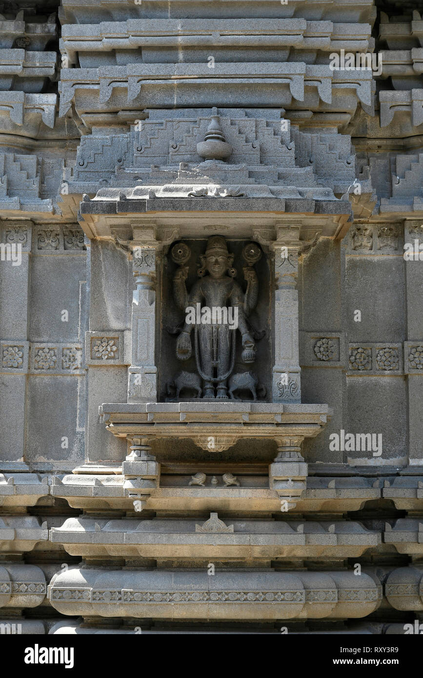 Stone masonry Shikhara with carvings of statue of Vishnu the God at ...