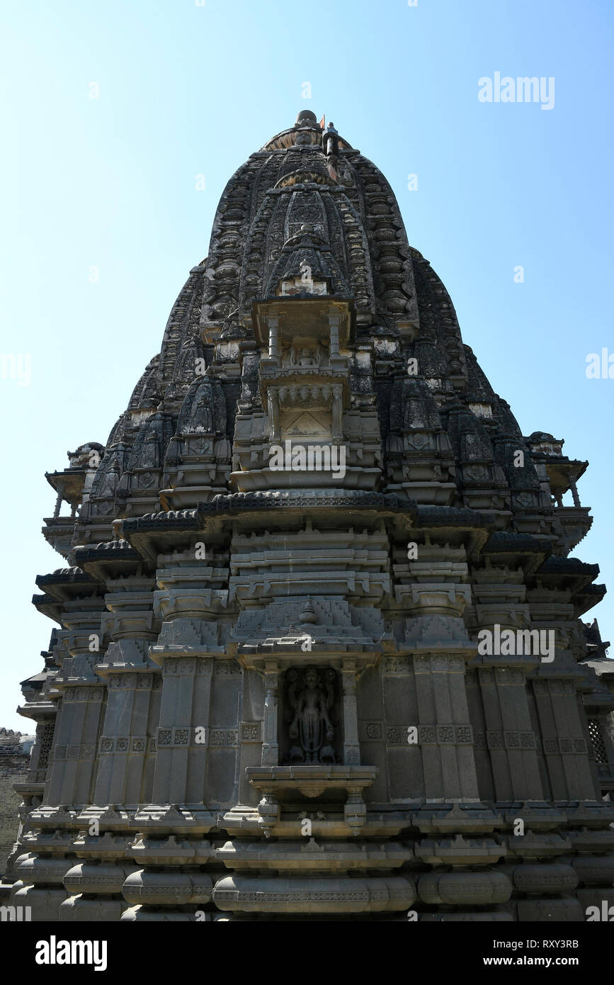 Stone masonry Shikhara with carvings of statue of Vishnu the God at ...
