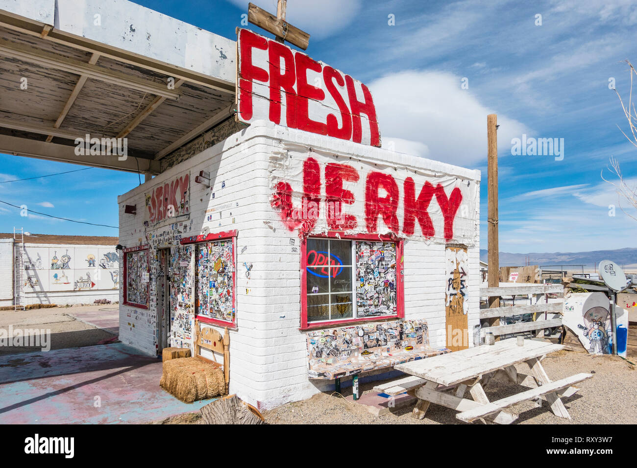 A small older white brick building along California highway 395 in the ...