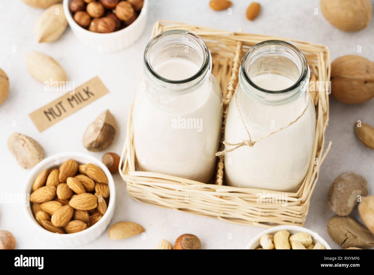Different nut milk in bottles and ingredients. Dairy free, no lactose ...