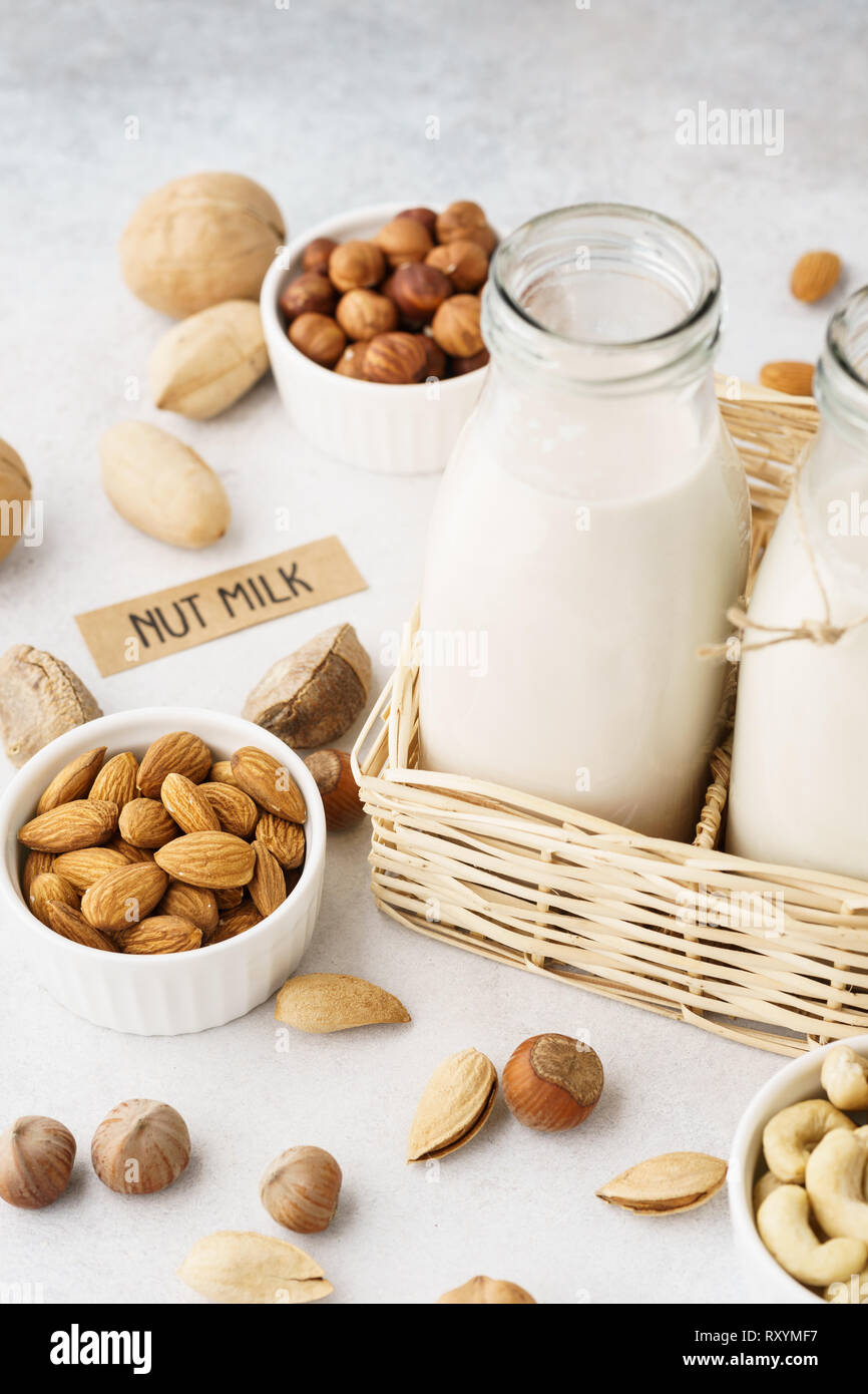 Various homemade nut milk and ingredients. Alternative milk. Vegan food ...