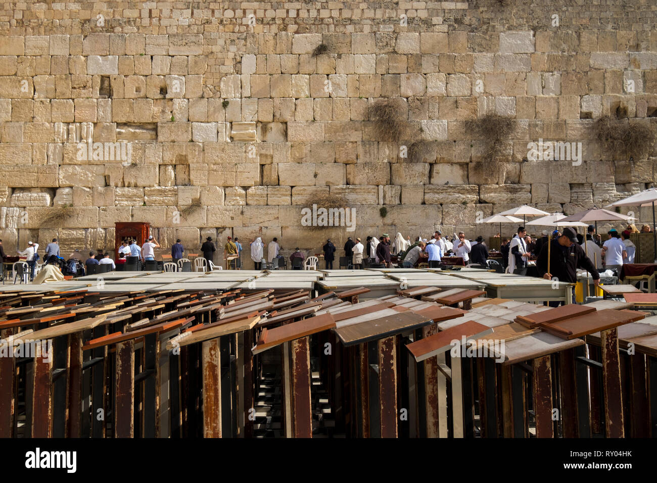Tables and prayer lecterns lined up at the Western, Wailing Wall in ...