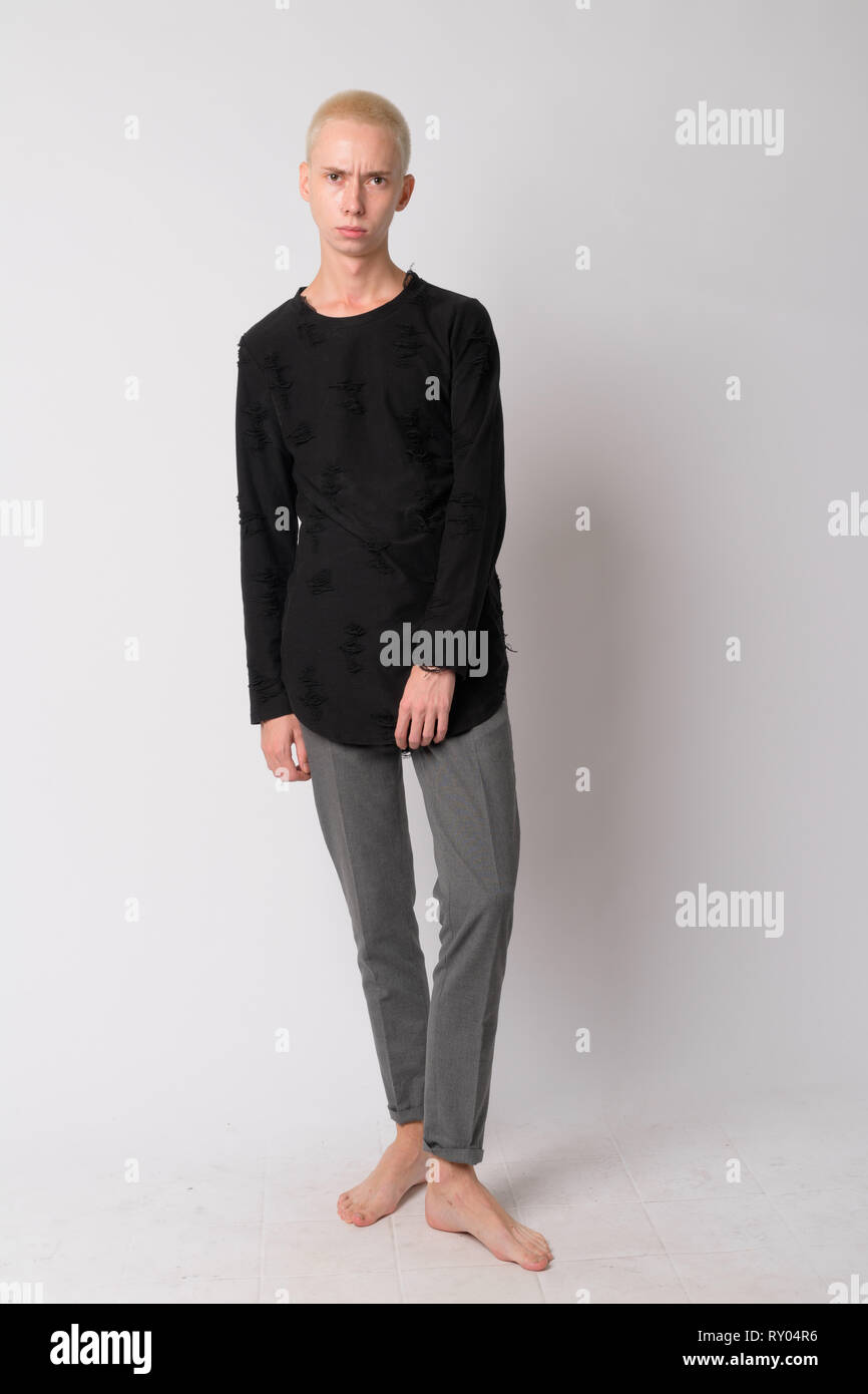 Full body shot of young handsome androgynous man Stock Photo - Alamy
