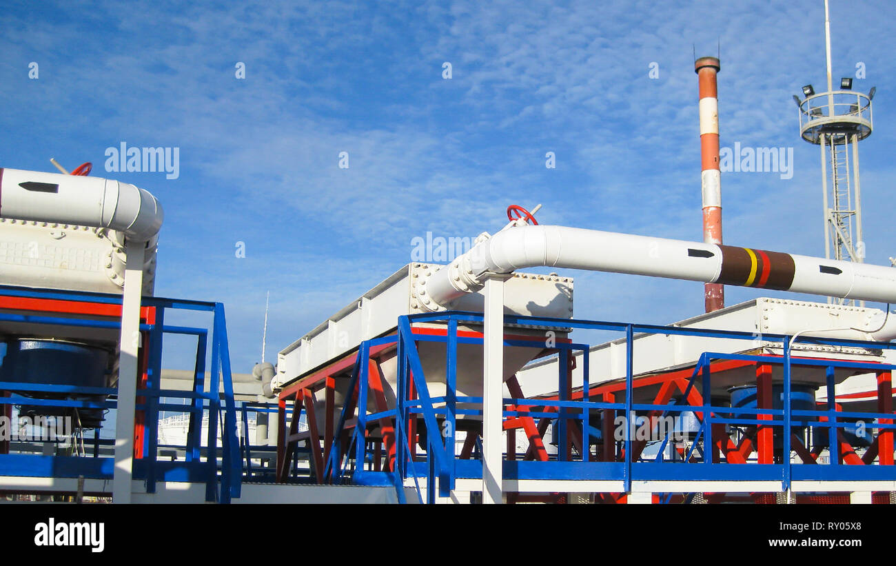 Steel service platform and stairs. Equipment refinery Stock Photo - Alamy