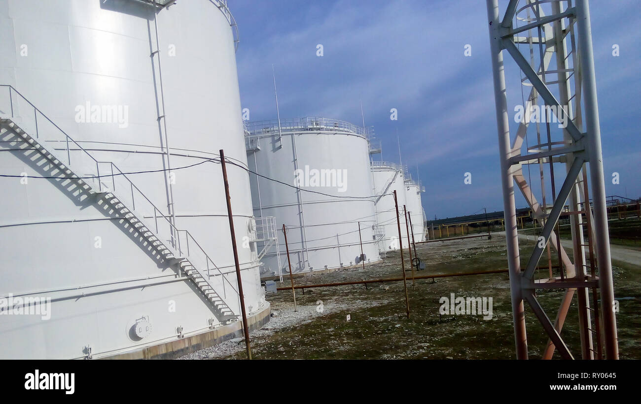 Storage tanks for petroleum products. Equipment refinery Stock Photo ...