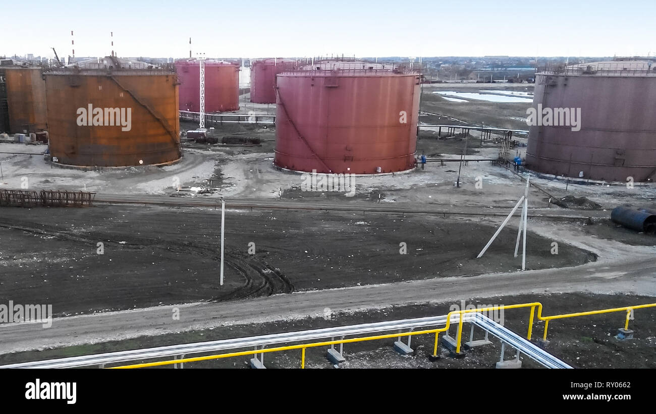 Tank the vertical steel. Oil refinery. Equipment for primary oil ...