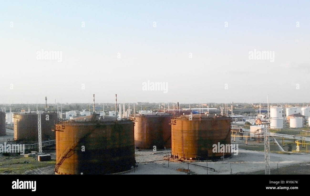 Tank the vertical steel. Oil refinery. Equipment for primary oil ...