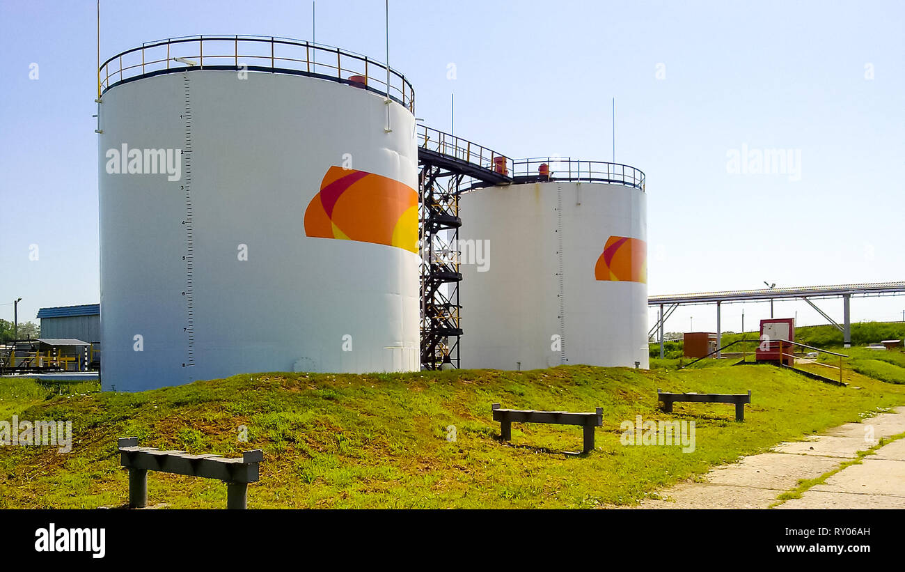 Tanks for oil storage. Oil field. The equipment of crafts, iron designs ...