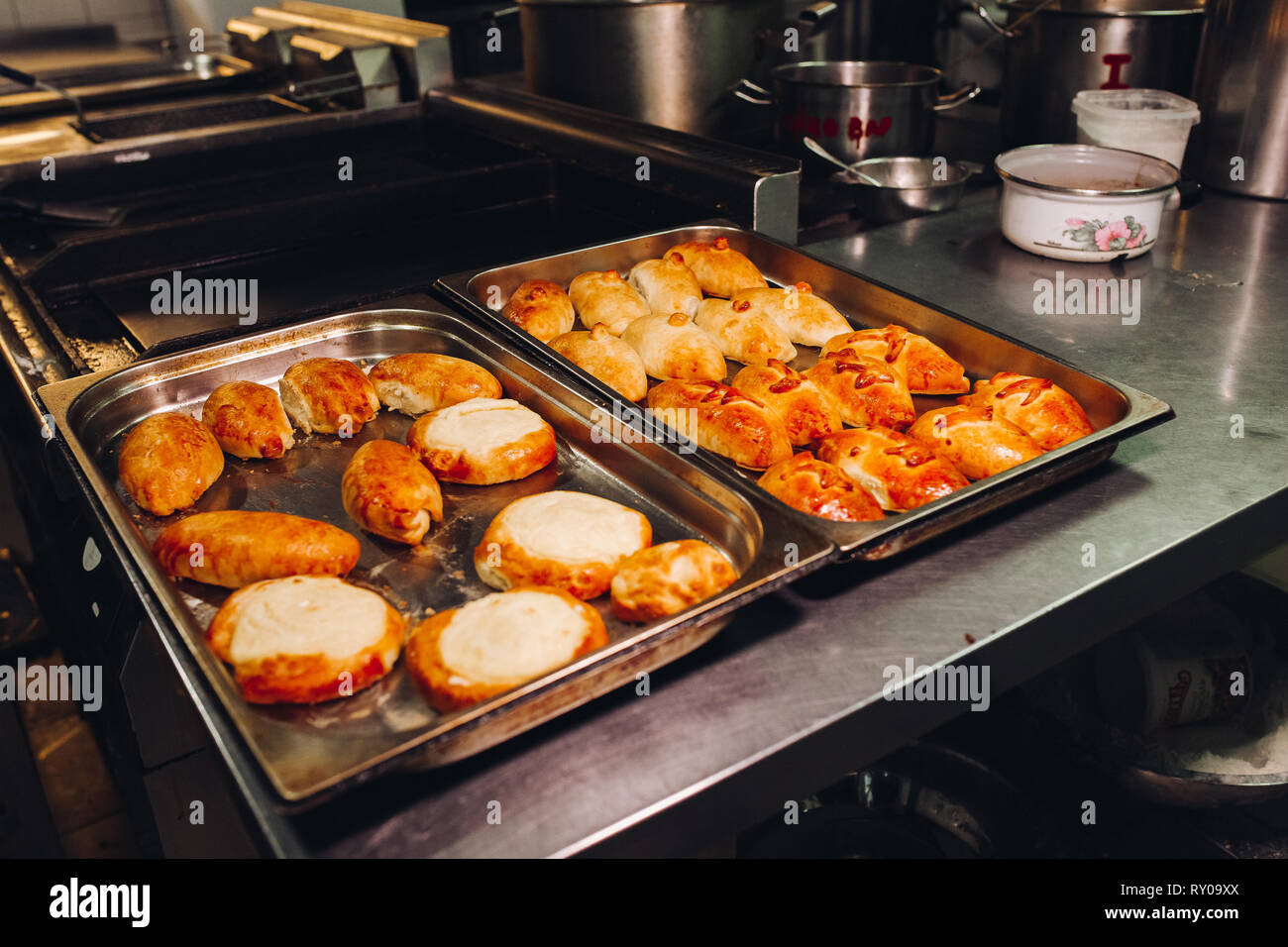 Delicious fresh baked flavored buns set made of sweet dough Stock Photo ...
