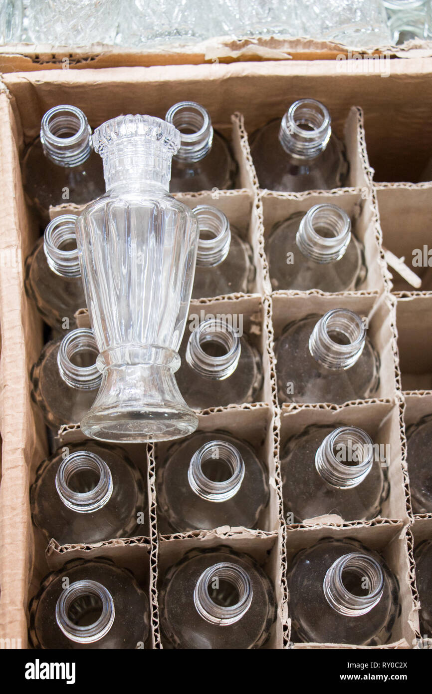 Set of Empty small transparent bottles in a box Stock Photo - Alamy