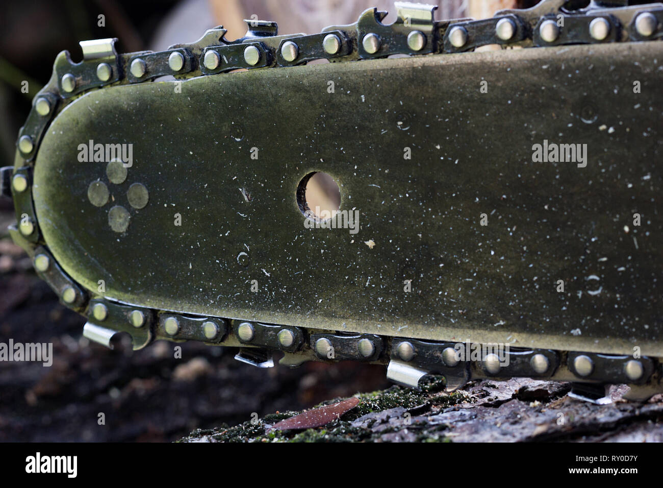 Close up chainsaw and teeth set on a chain around the edge Stock Photo ...
