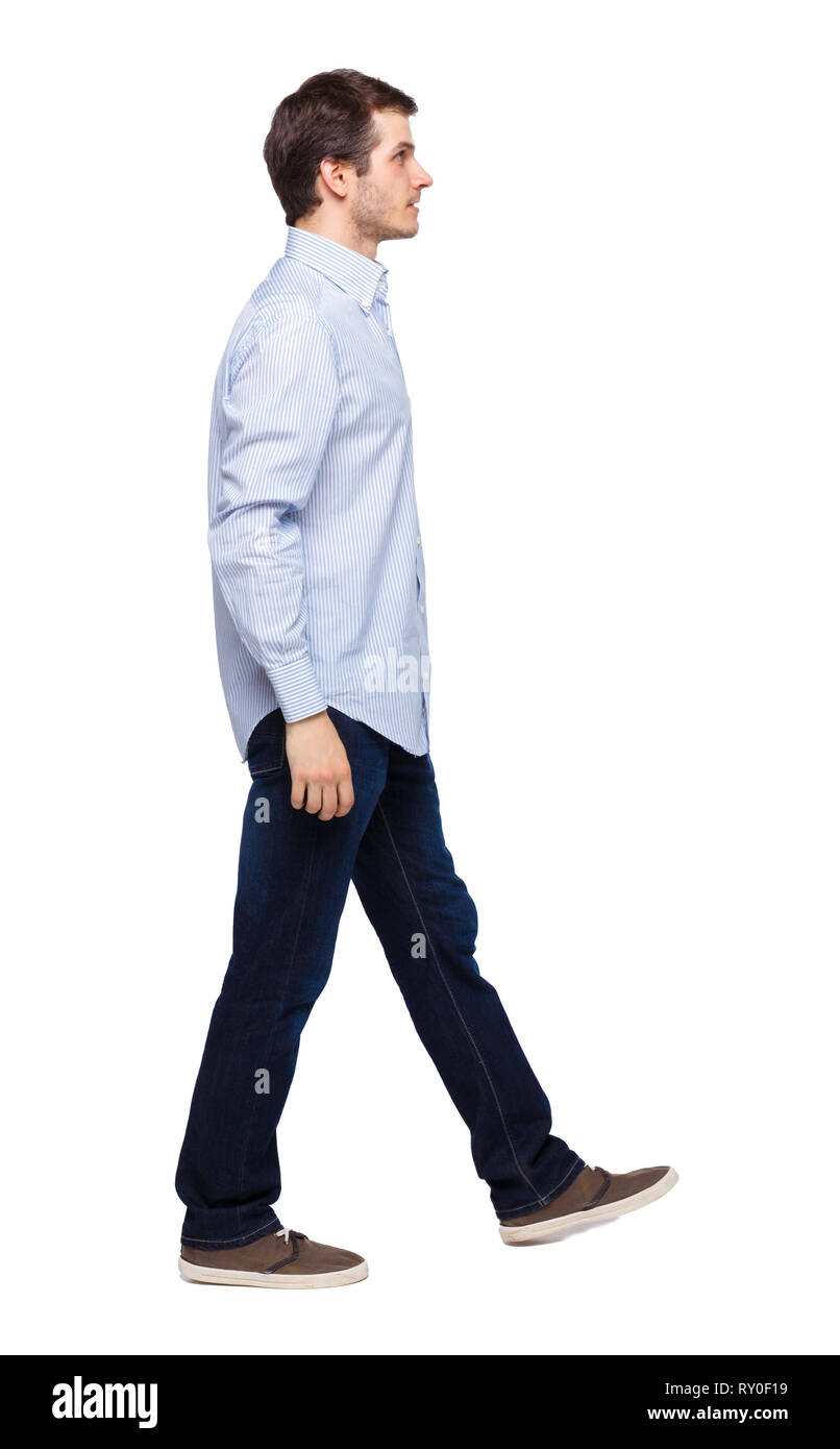 Side view of going handsome man. walking young guy . Rear view people ...