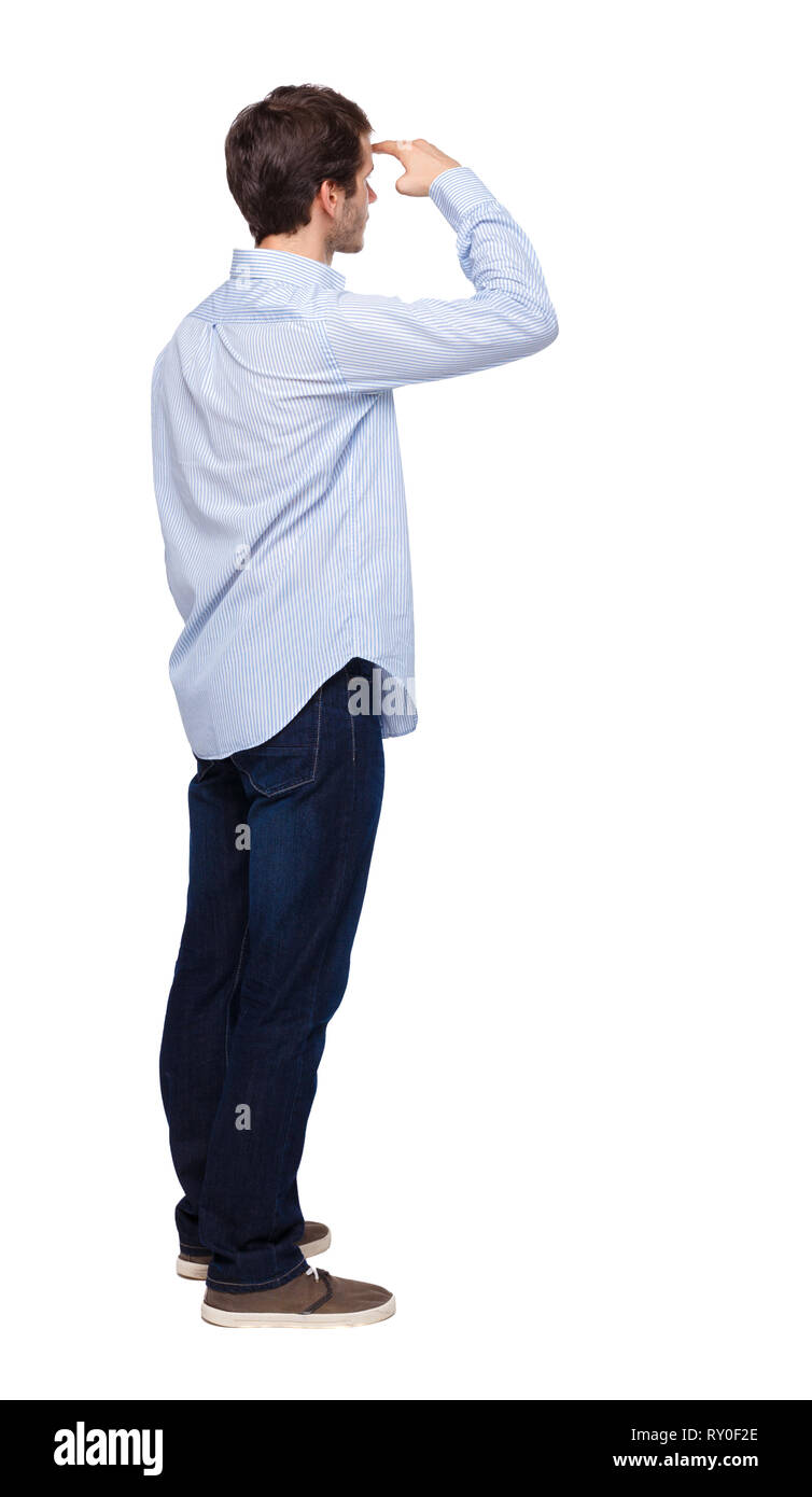 Back view of man in dark jeans. Standing young guy. Rear view people ...
