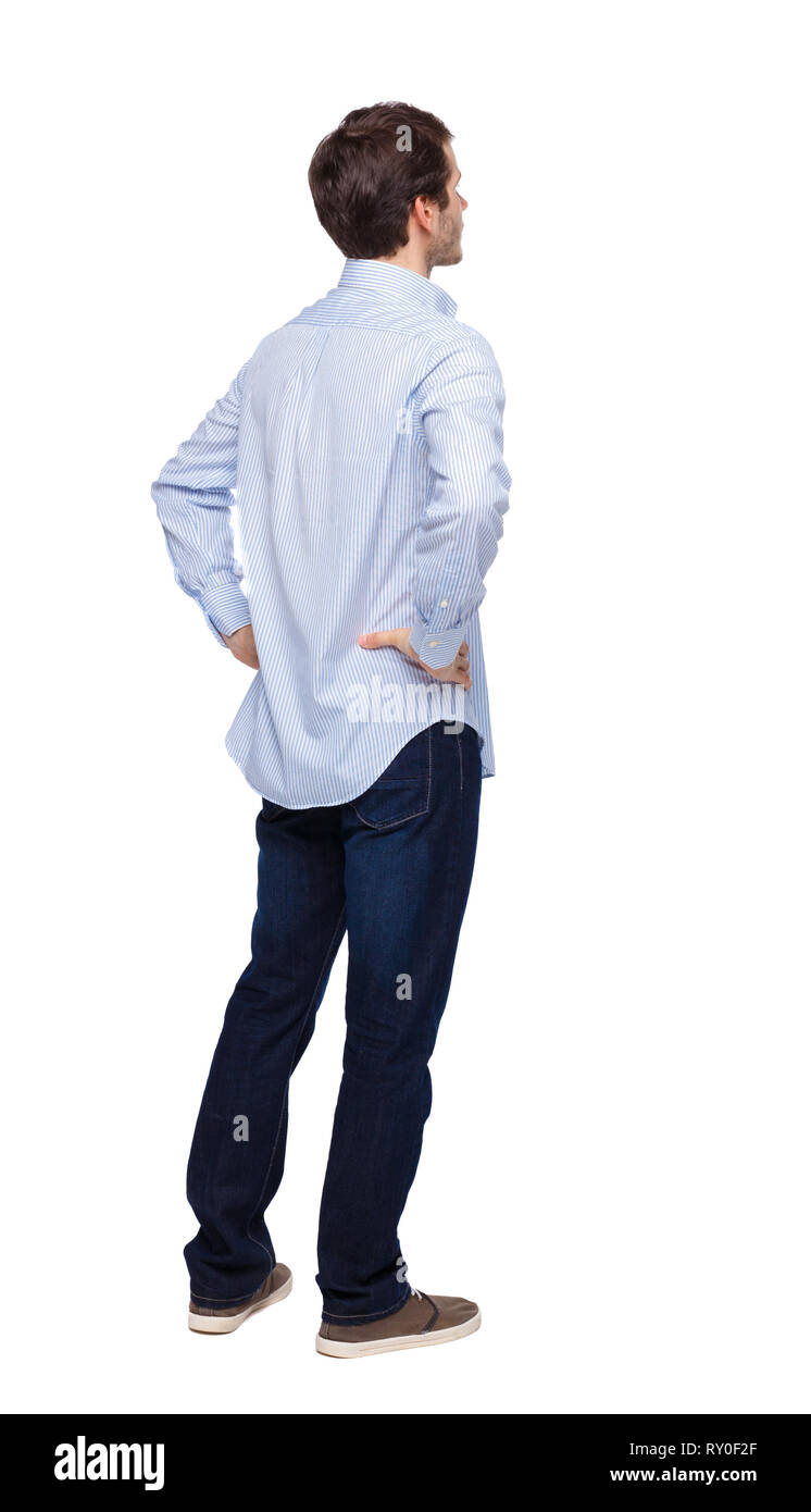 Back view of man in dark jeans. Standing young guy. Rear view people ...