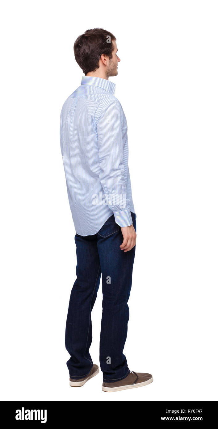 Back view of man in dark jeans. Standing young guy. Rear view people ...