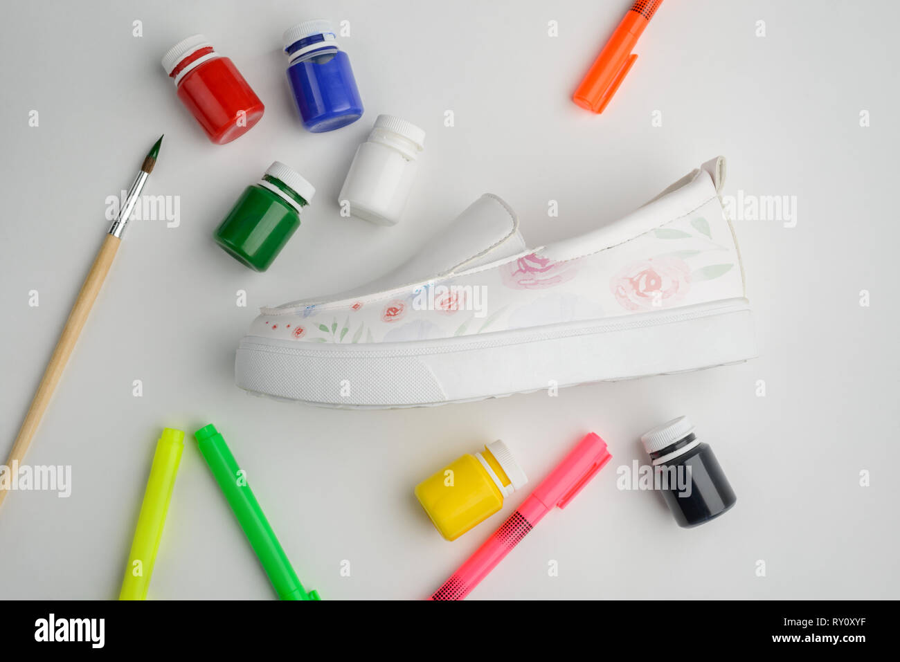 Hand painted slip-on shoe Stock Photo - Alamy