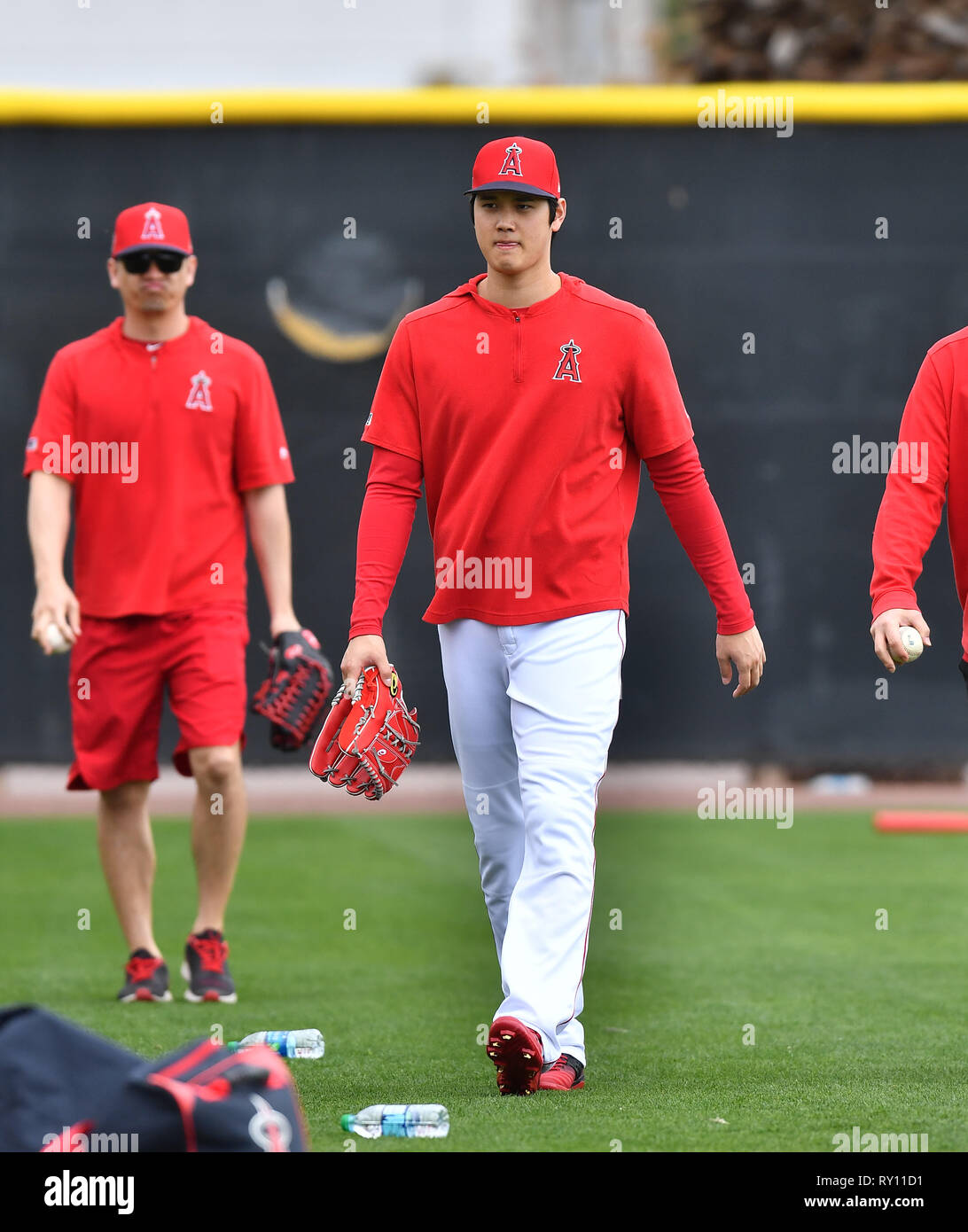 Shohei Ohtani of the Los Angeles Angels walk off the field during ...