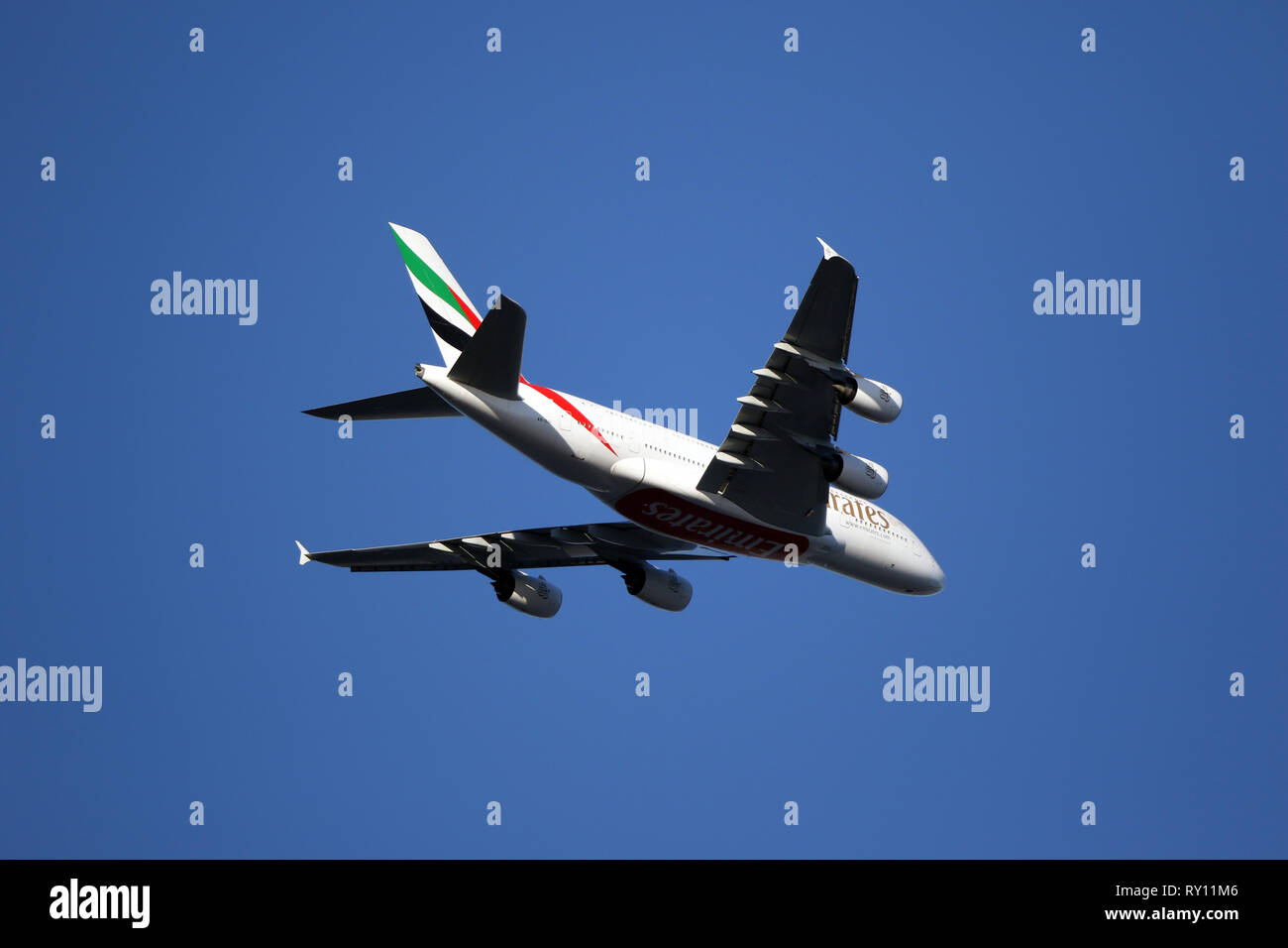 London, UK. 10th Mar, 2019. An Emirates airplane flies above The ...