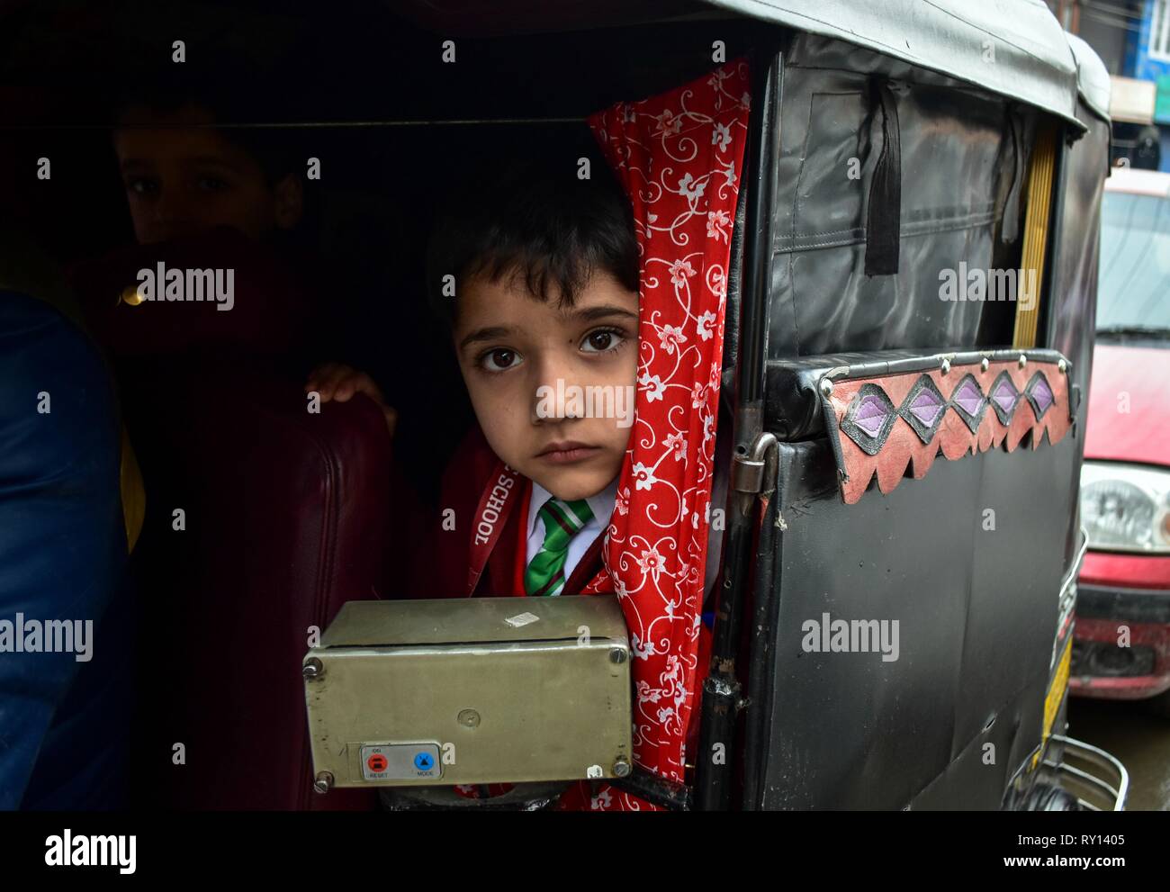 Children in an auto rickshaw hi-res stock photography and images - Alamy