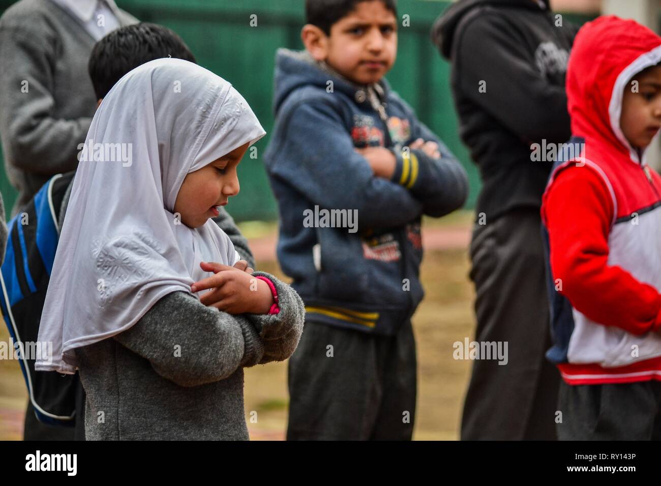 March 11, 2019 - Srinagar, J&K, India - A Kashmiri student prays during morning assembly in ...