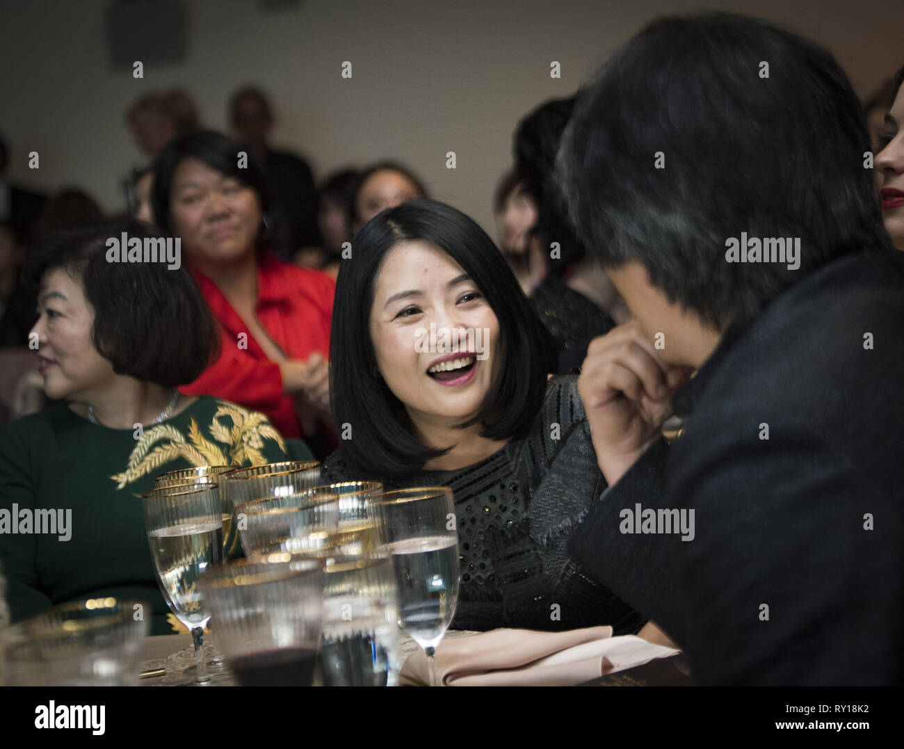 Santa Ana, CA, USA. 7th Mar, 2019. Chinese Couturier Guo Pei laughs ...