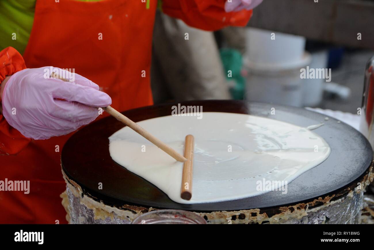 March 9, 2019 - Kiev, Ukraine - Pancake seen being made on a pan during ...