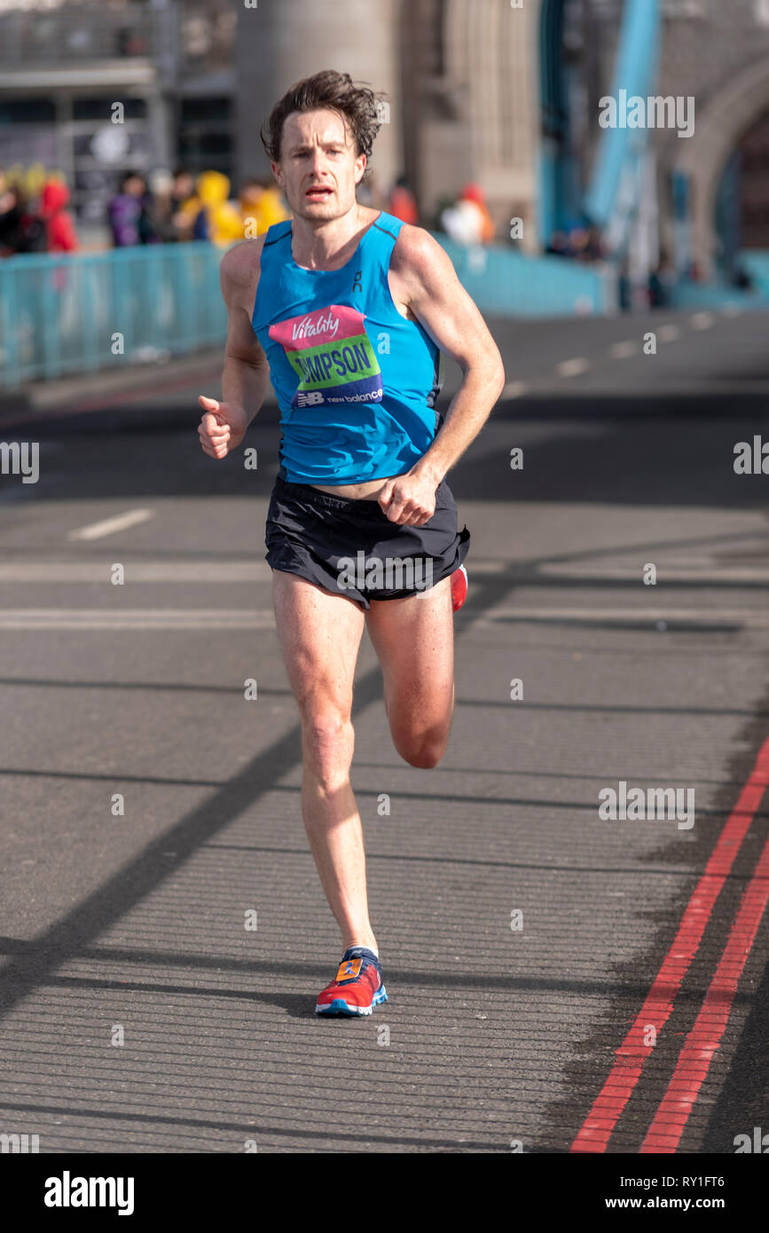 Chris Thompson running in the Vitality Big Half half marathon crossing ...