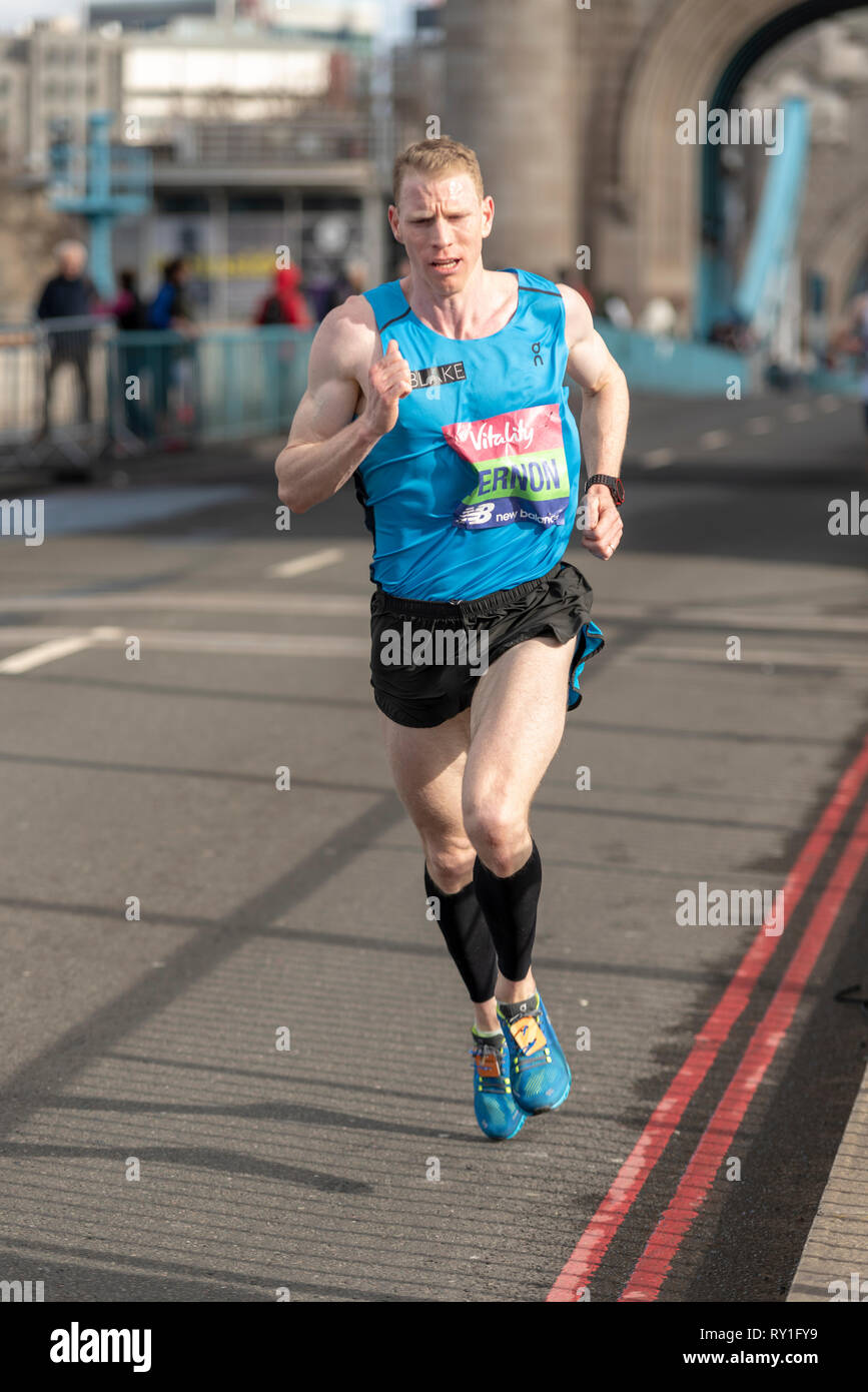 Andy Vernon running in the Vitality Big Half half marathon crossing ...