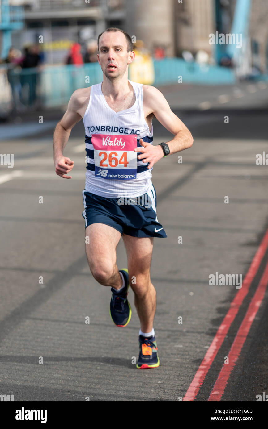 Ben Cole 264 running in the Vitality Big Half half marathon crossing ...