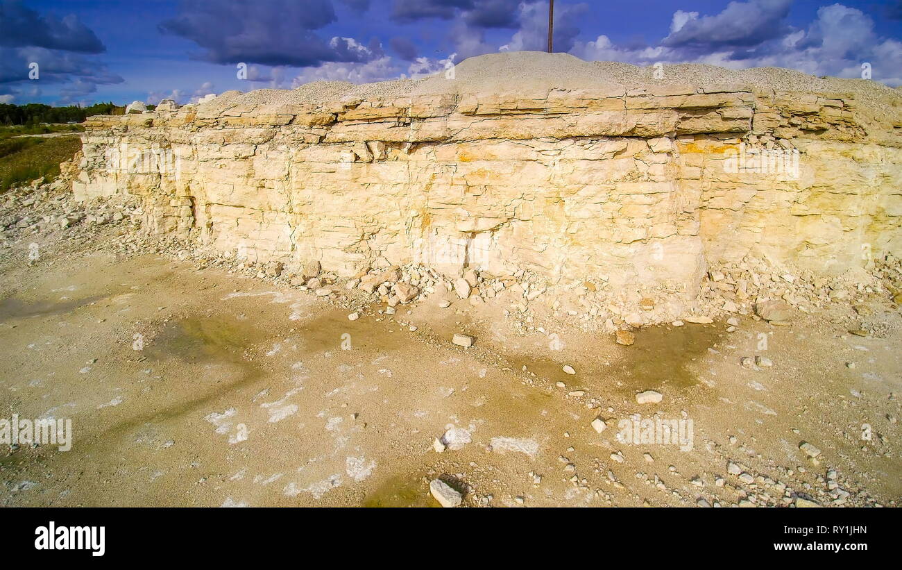 The mountain of limestones in a quarry. Limestone is a sedimentary rock ...