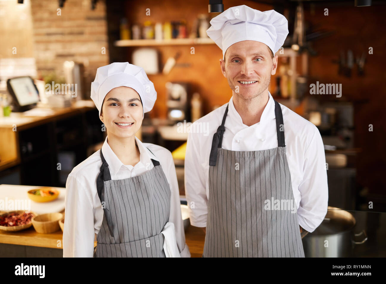 Two Chefs Posng Stock Photo - Alamy